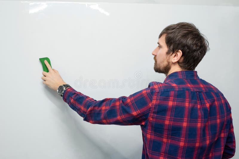 Young Man Working in the Office, Making a Presentation on a Flip Chart ...
