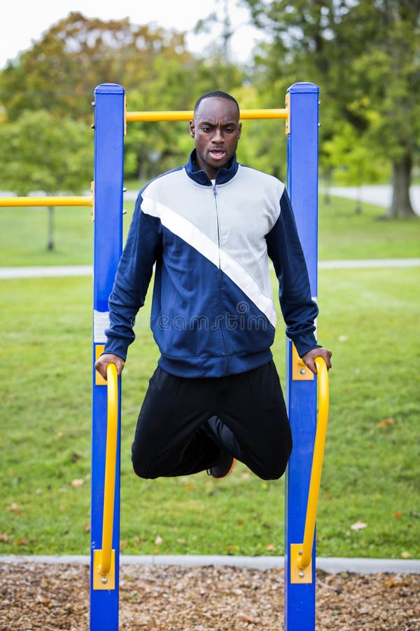 Young Man Working Out at Outdoor Gym Stock Photo - Image of athletic ...
