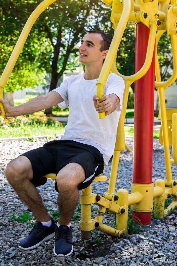 Young Man Working Out Outdoor Stock Photo - Image of cheerful, slim ...