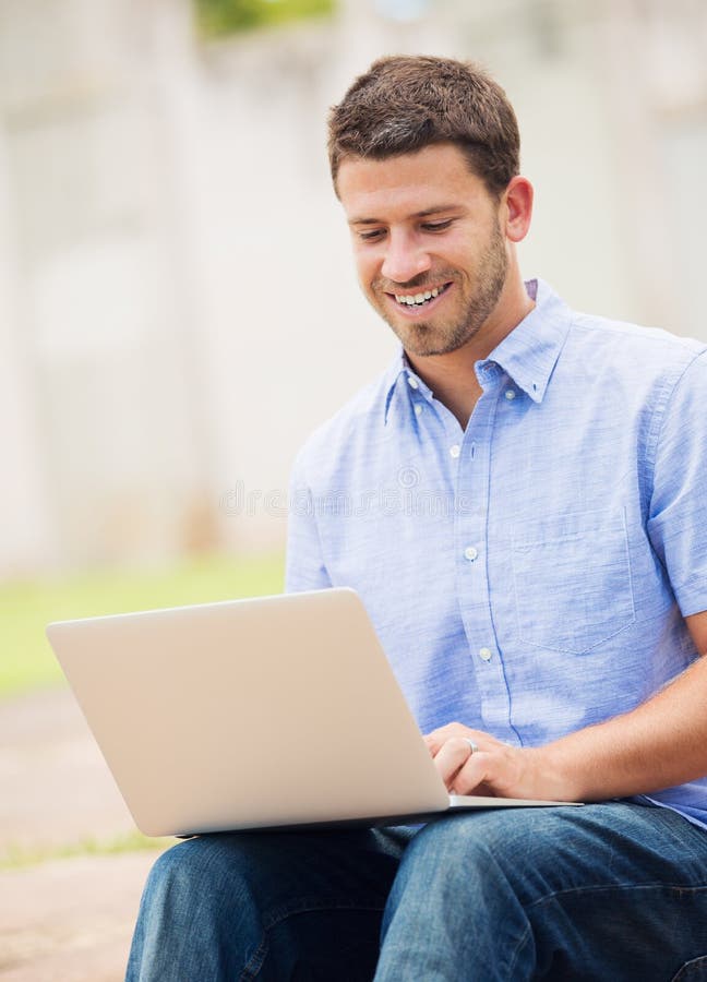 Young Man Working Outside on Laptop Stock Photo - Image of businessman ...