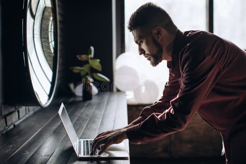 Remote Work. Young Man Working at Computer at Home Stock Photo - Image ...