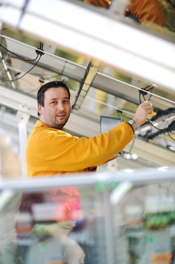 Young Man Working at Solar Panels Stock Photo - Image of collaboration ...