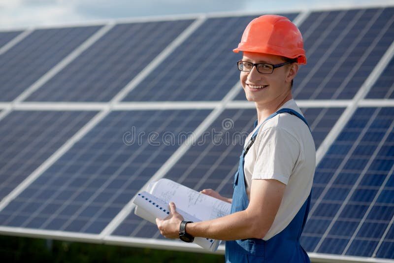 Young Man Working with Solar Panels. Stock Photo - Image of solar, home ...