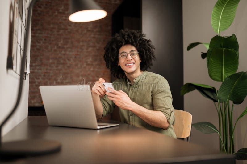 Young Man Working at the Table in a Hotel Room Stock Image - Image of ...