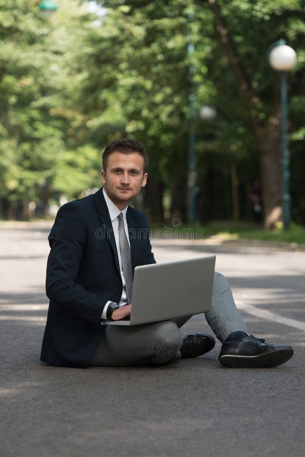 Young Man Working on Tablet Outside the Office Stock Photo - Image of ...