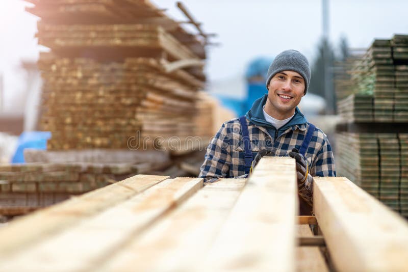 Young Male Worker in Timber Warehouse Stock Photo - Image of people ...