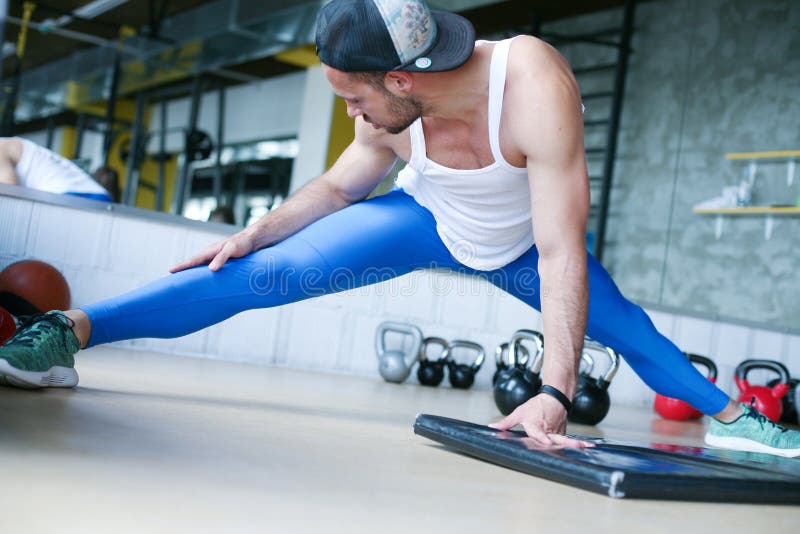 Young Man Workout in Healthy Club. Stock Image - Image of class ...