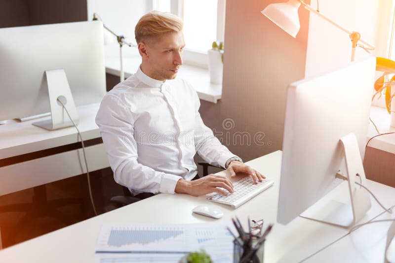 Young Man at the Workplace in Office Stock Image - Image of computer ...