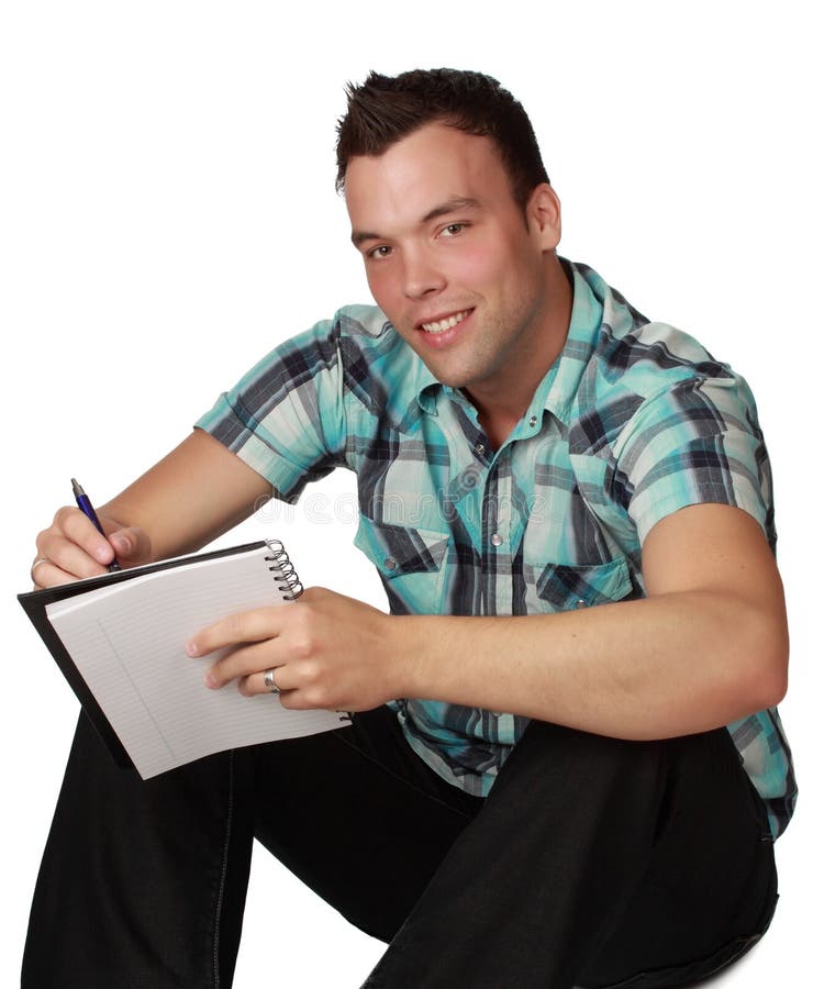 Young man writing stock photo. Image of writing, note - 15856856