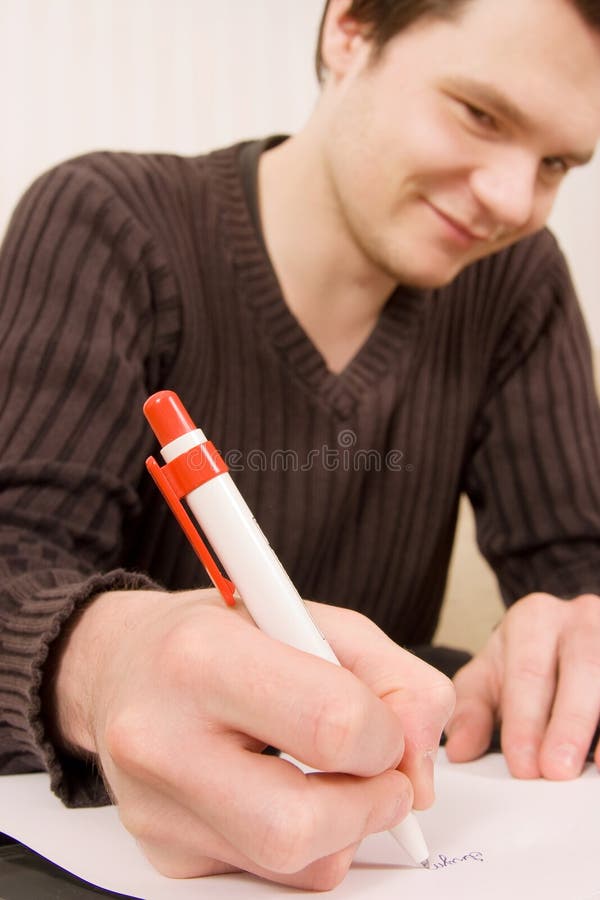 Young man writing stock image. Image of person, successful - 3350381