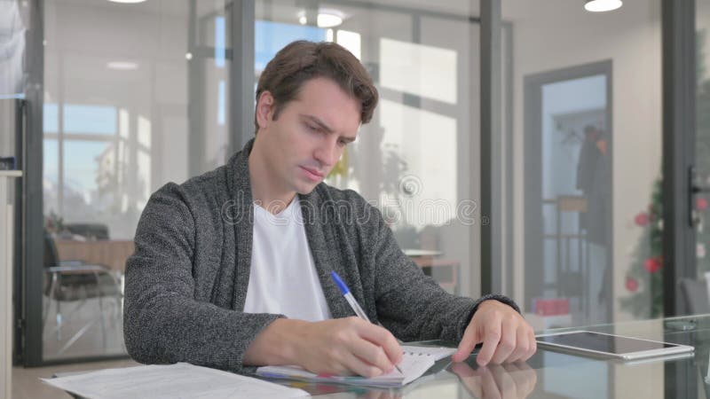Young Man Writing a Letter in Office Stock Video - Video of data ...