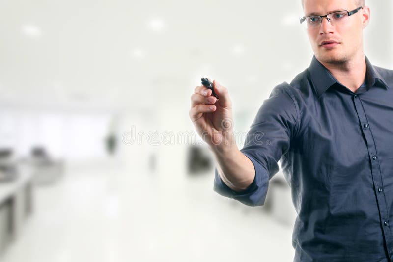 Young Man Writing Something with Marker in the Office Stock Photo ...