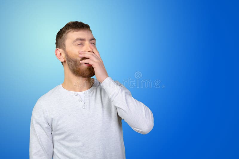 Young man yawning stock image. Image of sleepy, think - 68089755