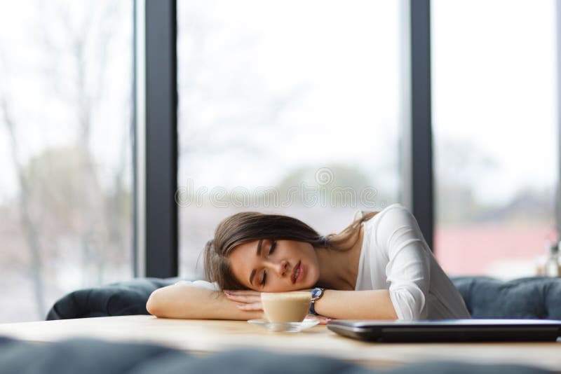 Young Manager Sleeping on the Table in the Restaurant Stock Photo ...