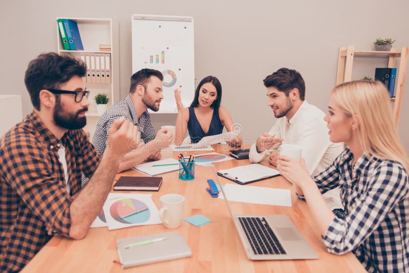 Young Managers Conversing at Conference Table, they Planning New ...