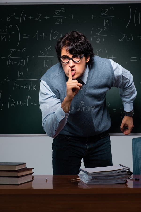 The Young Math Teacher in Front of Chalkboard Stock Image - Image of ...