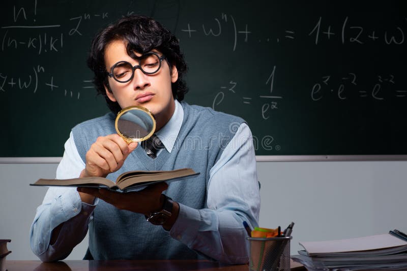 The Young Math Teacher in Front of Chalkboard Stock Image - Image of ...