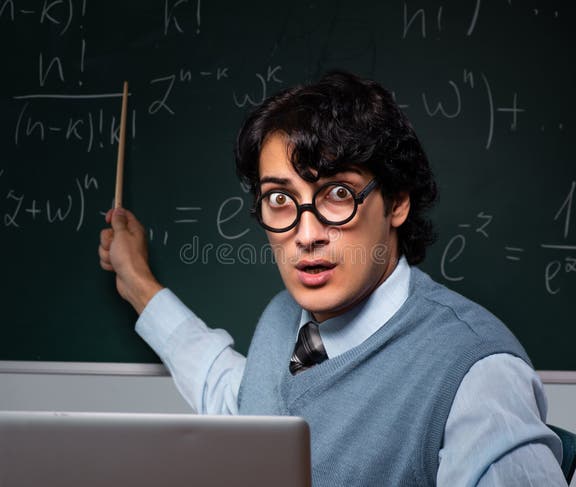 Young Math Teacher in Front of Chalkboard Stock Photo - Image of ...