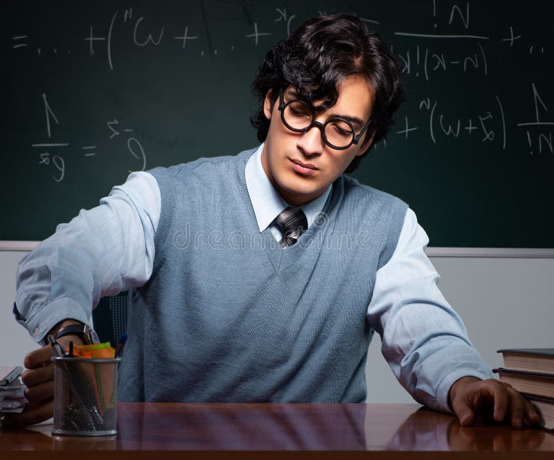 Young Math Teacher in Front of Chalkboard Stock Image - Image of ...