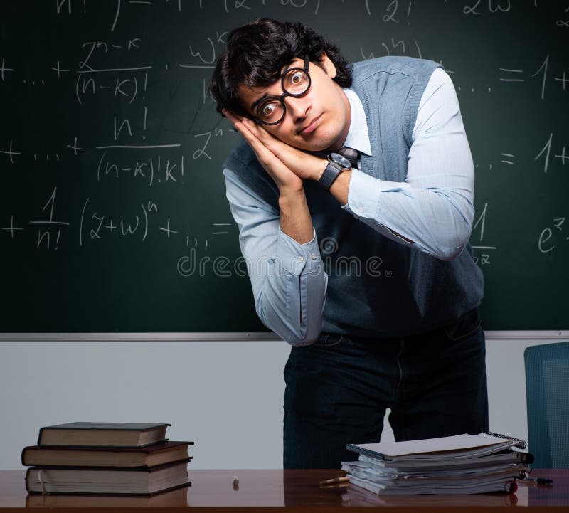 Young Math Teacher in Front of Chalkboard Stock Photo - Image of ...