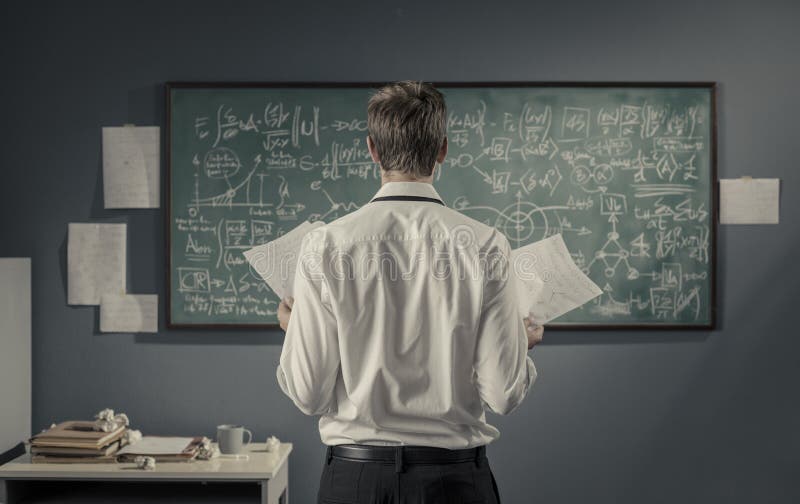 Mathematician Studying Math Formulas on the Chalkboard Stock Photo ...