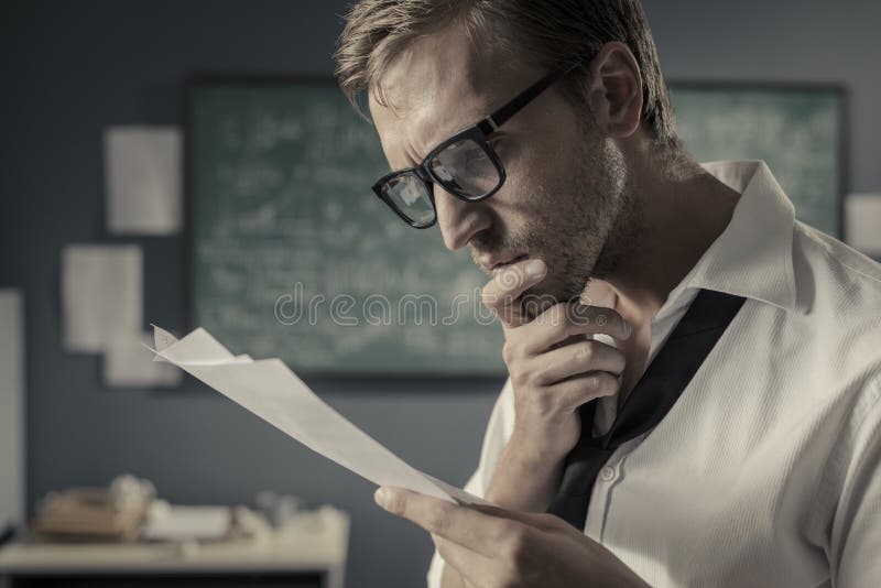Young Mathematician Studying in His Office and Reading Papers Stock ...