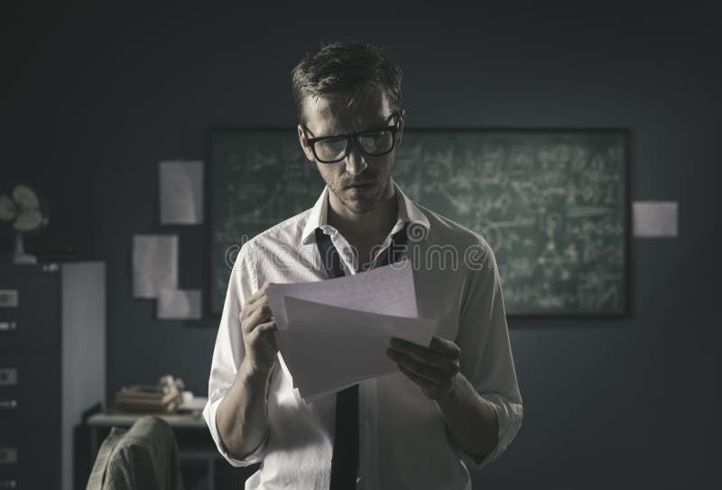 Young Mathematician Studying in His Office and Reading Papers Stock ...