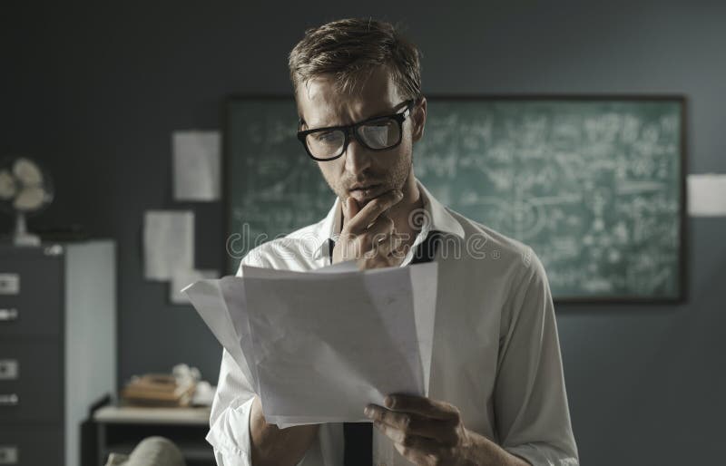 Young Mathematician Studying in His Office and Reading Papers Stock ...