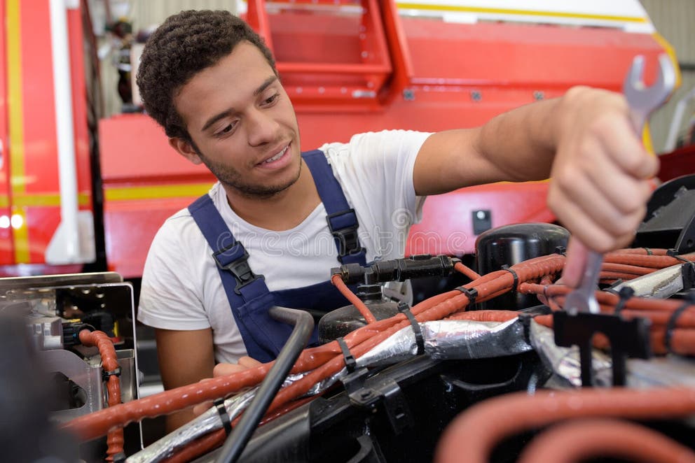 Young Mechanic Using Spanner Stock Photo - Image of spanner, industrial ...