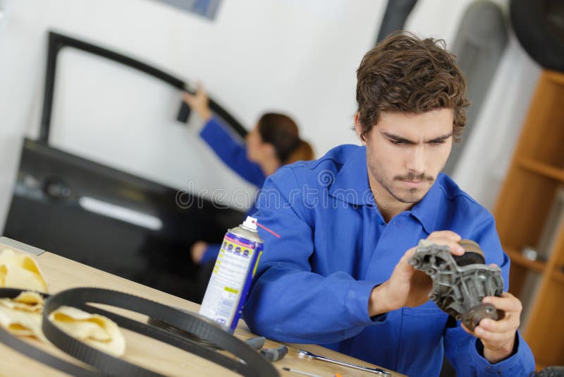 Young Mechanics Apprentices in Workshop Stock Photo - Image of ...