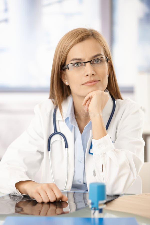 Young Medical Student Sitting at Desk in Office Stock Image - Image of ...