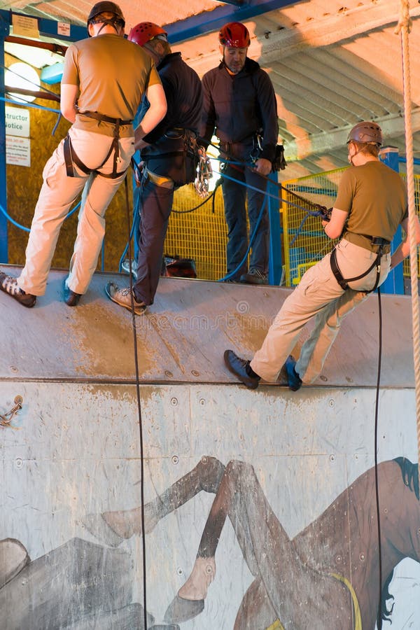 Young Men Abseiling Indoors Editorial Stock Photo - Image of teamwork, hope: 97443698