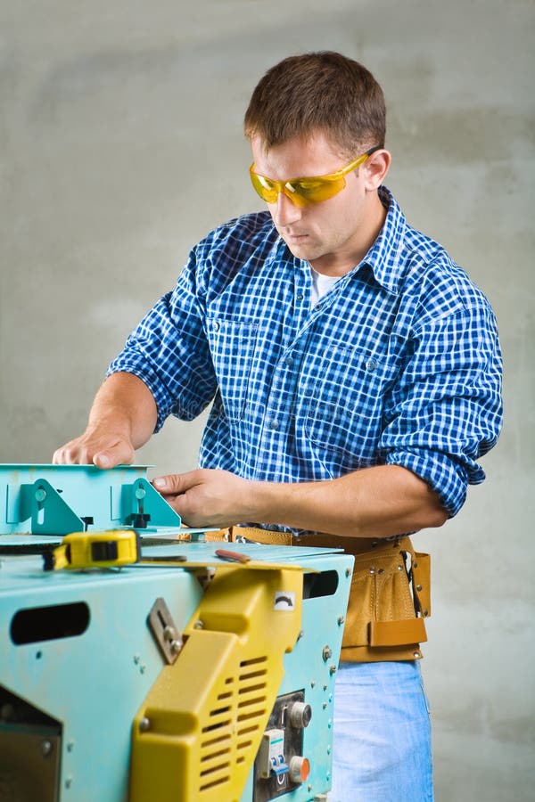 Young Men Adjusts Woodworking Mashine Stock Image - Image of home ...