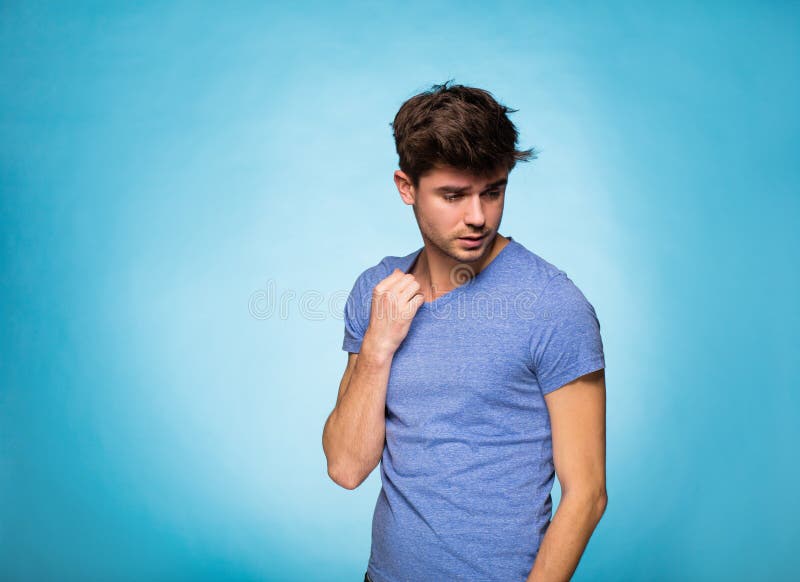 Young Men on Blue Background Stock Photo - Image of crossed, copy: 66709374