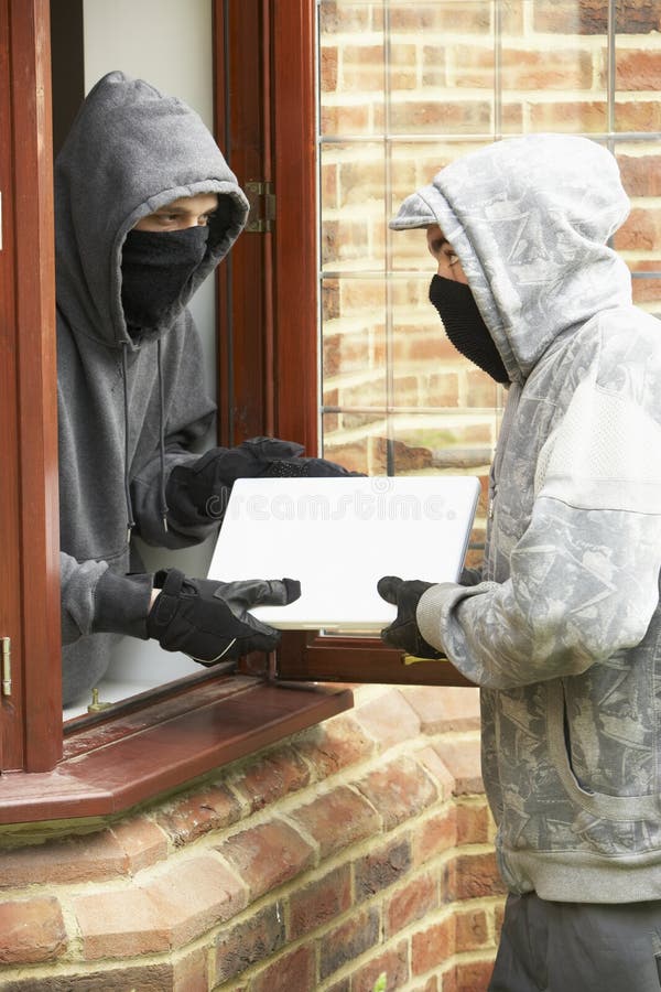 Young Men Breaking into House Stock Image - Image of criminal, outdoors ...