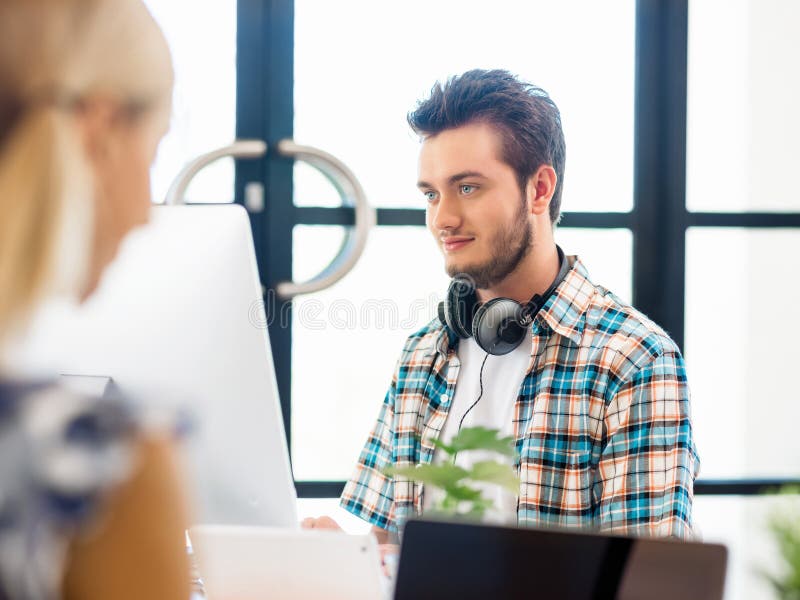 Young Man Working in Office Stock Photo - Image of technology, happy ...