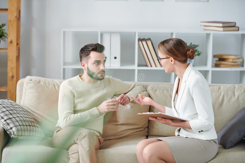 Interaction on couch stock photo. Image of crisis, counselor - 143181078