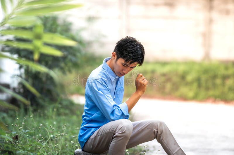 Young Men in Depression Sitting Alone in the Park. Depressed and ...
