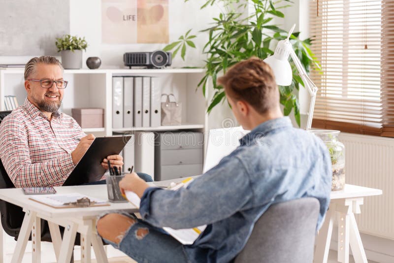 Young man at therapist stock photo. Image of mental - 179625404