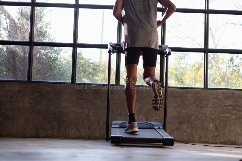 Young Men Exercise on an Automatic Treadmill Stock Photo - Image of ...