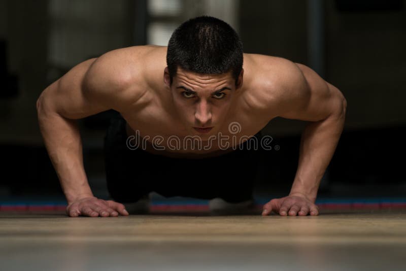 Young Men Exercising Push Ups Stock Image - Image of recreational ...