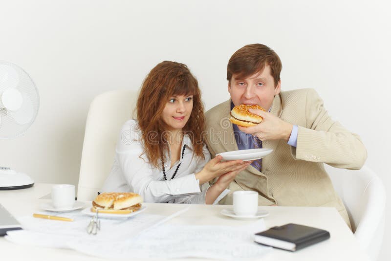 Young Men Have Dinner on Workplace Stock Image - Image of girl ...
