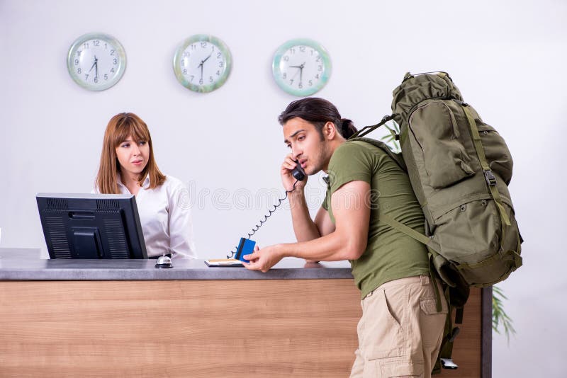 Young Man at the Hotel Reception Stock Photo - Image of phone, hotel ...