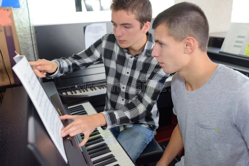 Young Men Learning To Play Piano Stock Photo - Image of dating ...