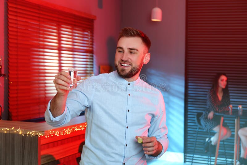 Young Man with Mexican Tequila Shot in Bar Stock Image - Image of ...