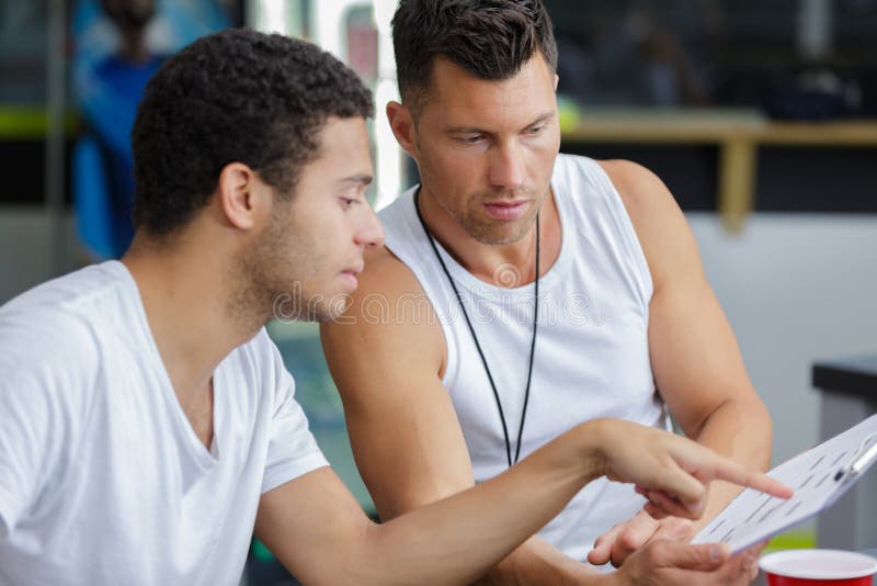 Young Man with Personal Trainer Stock Image - Image of sport, lifestyle ...