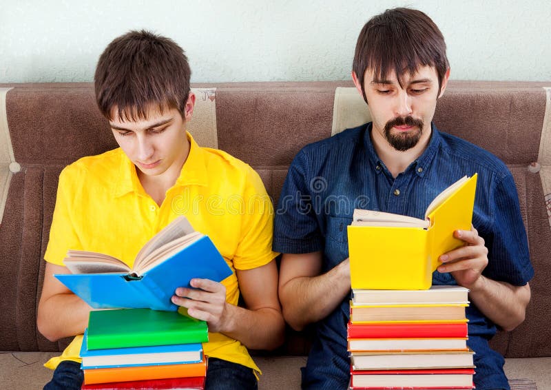 Young Men read a Books stock photo. Image of couch, male - 119415574
