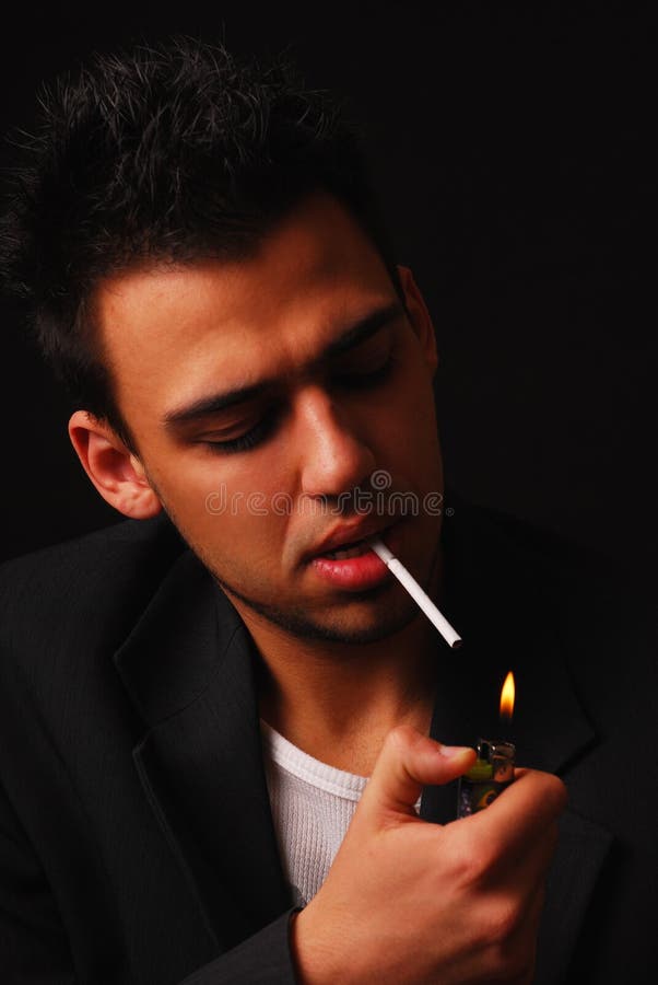 Young Men Smoking Cigarette Stock Image - Image of glamour, light: 13000457