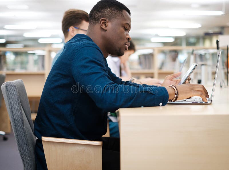 Young Men Studying in Public Library Stock Image - Image of multi ...