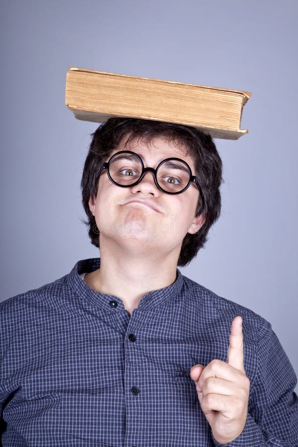 Young Men Thoughtful Men With Book Over Head. Stock Image - Image of ...